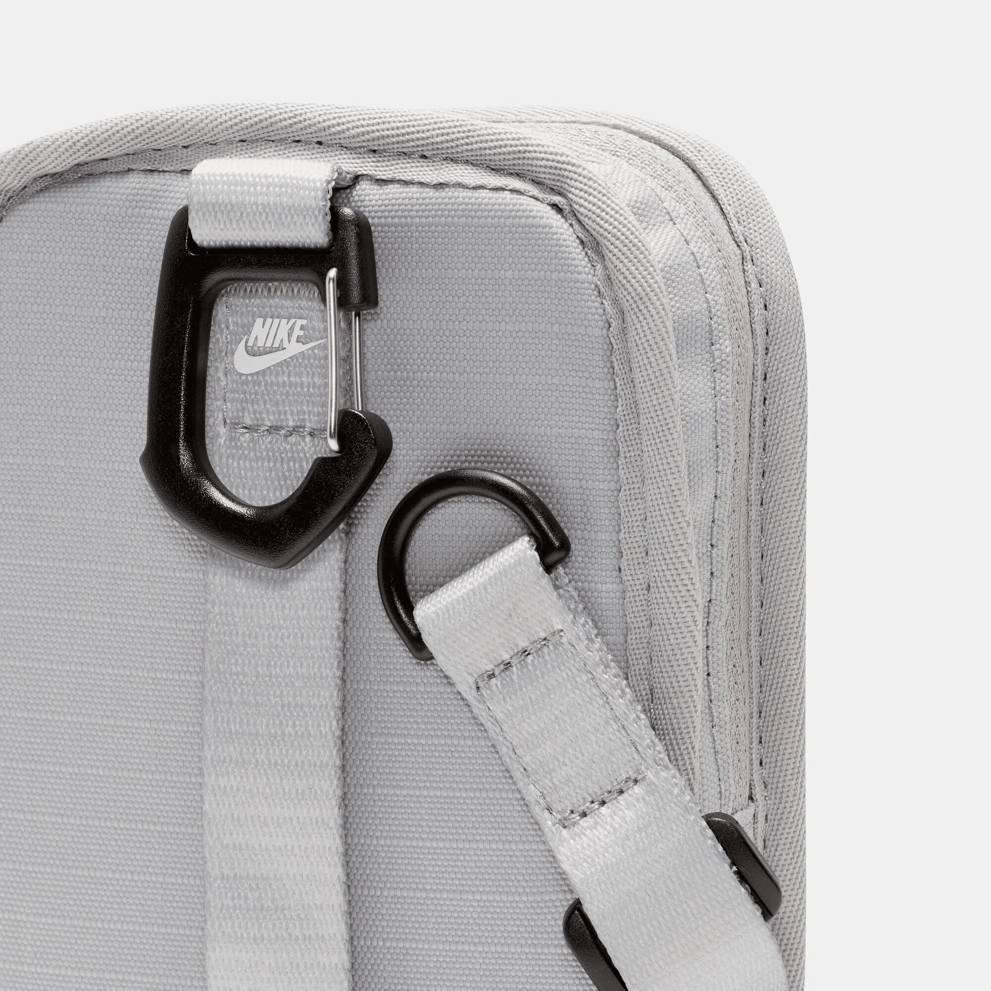 Buy Nike Club Phone Bag - Matte Silver/Black/White @ Nike Kuwait