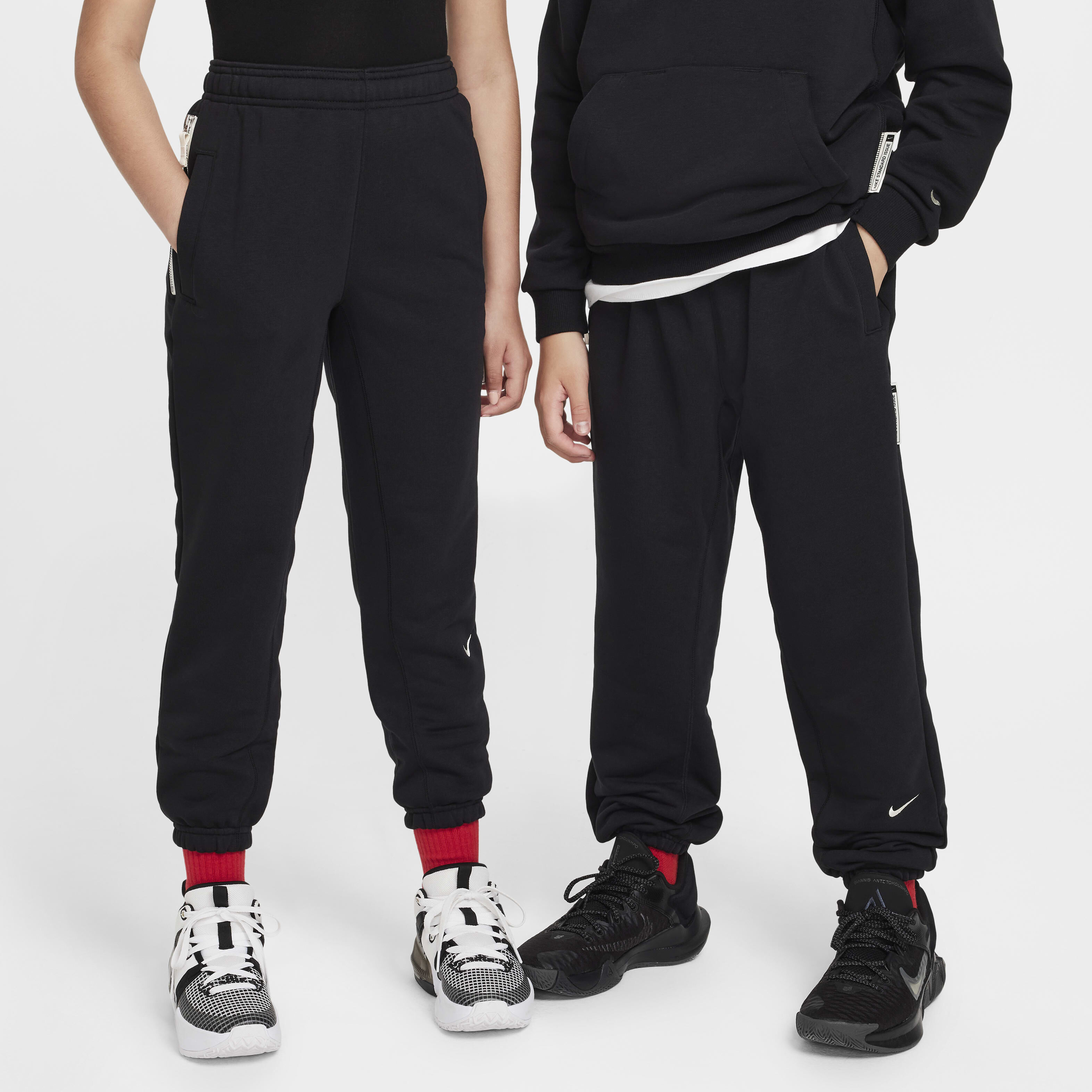 Buy Nike Standard Issue Older Kids' Dri-FIT Fleece Trousers - Black/Pale Ivory | Nike Kuwait ...